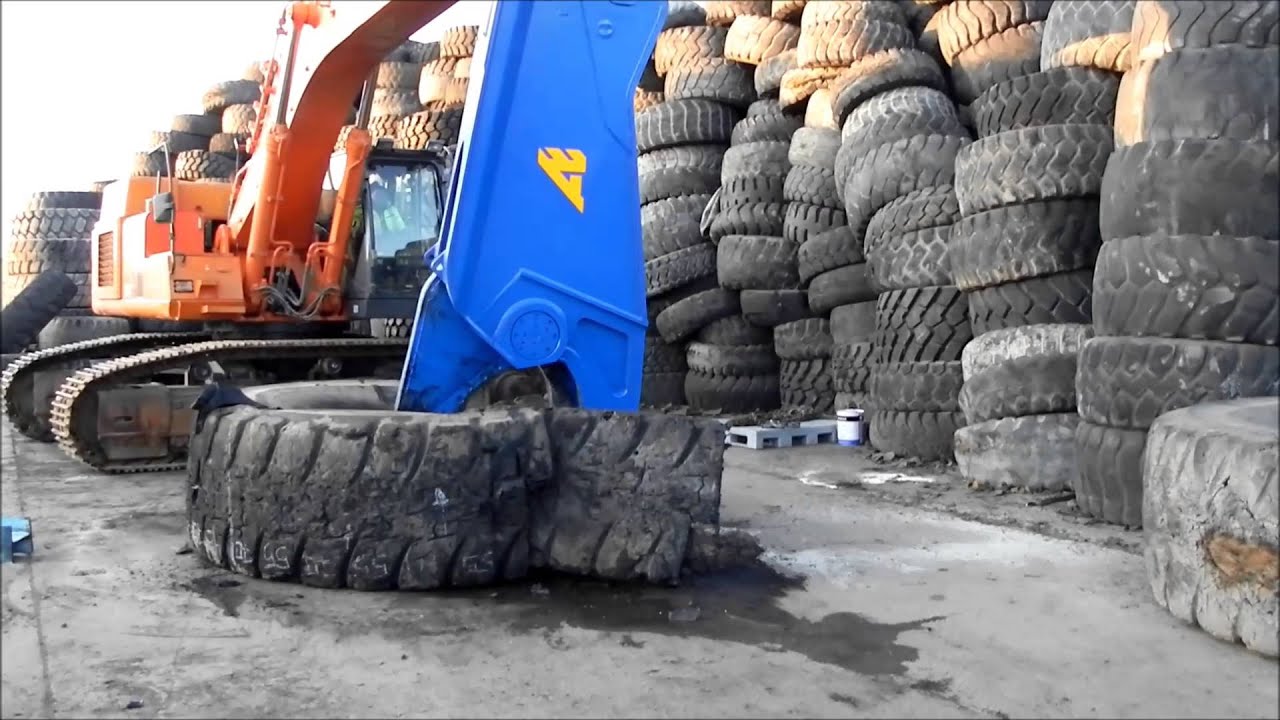 Tires recycling - cutting tires with excavators and ARDEN shears from 1 ...