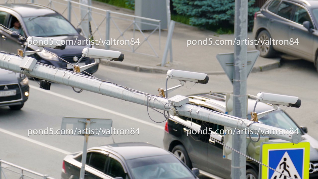 Closeup of four traffic security camera surveillance (CCTV) on the road ...
