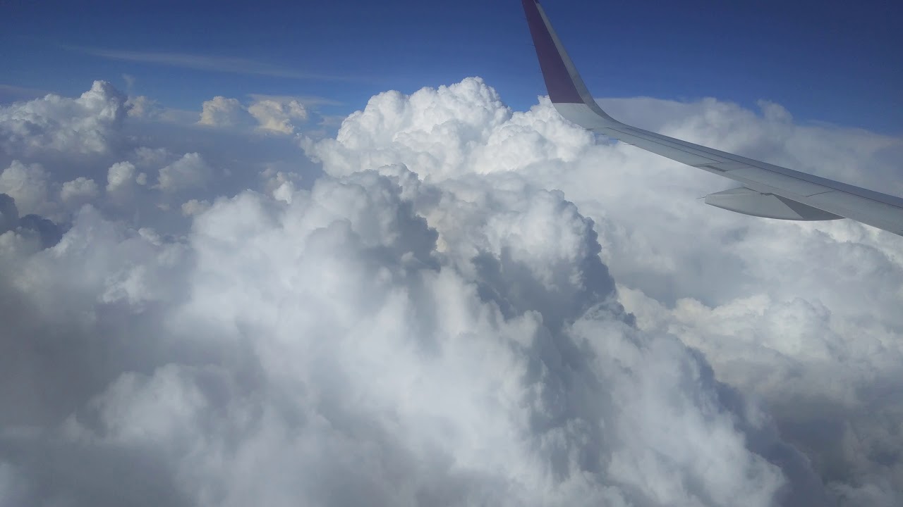 Flying through the clouds - YouTube