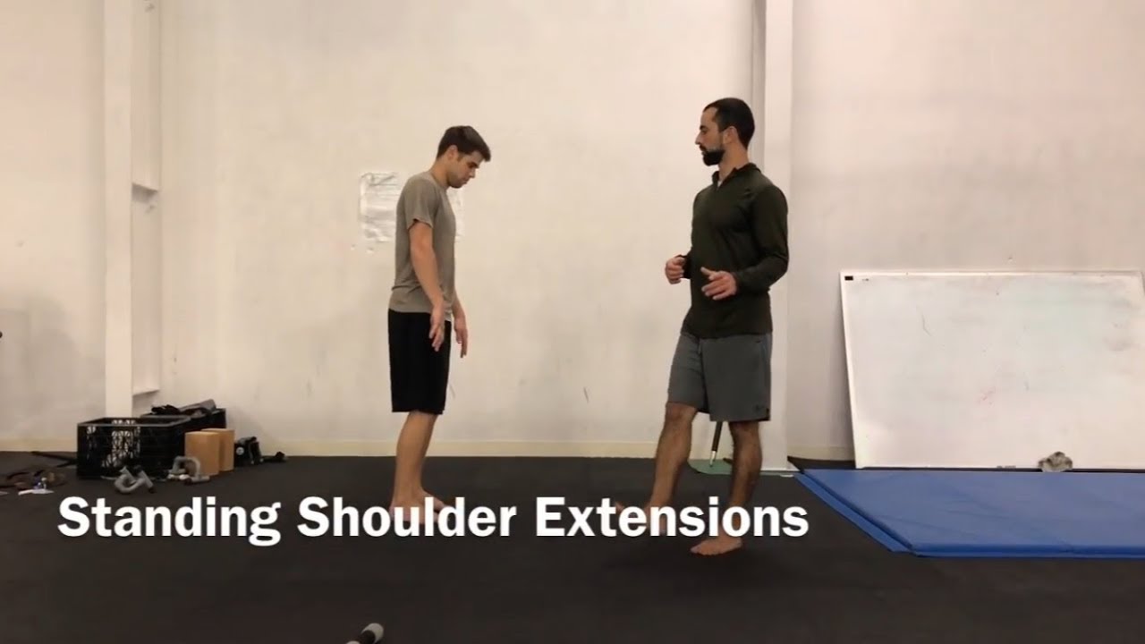 Standing Shoulder Extensions - Shoulder Prehab - YouTube