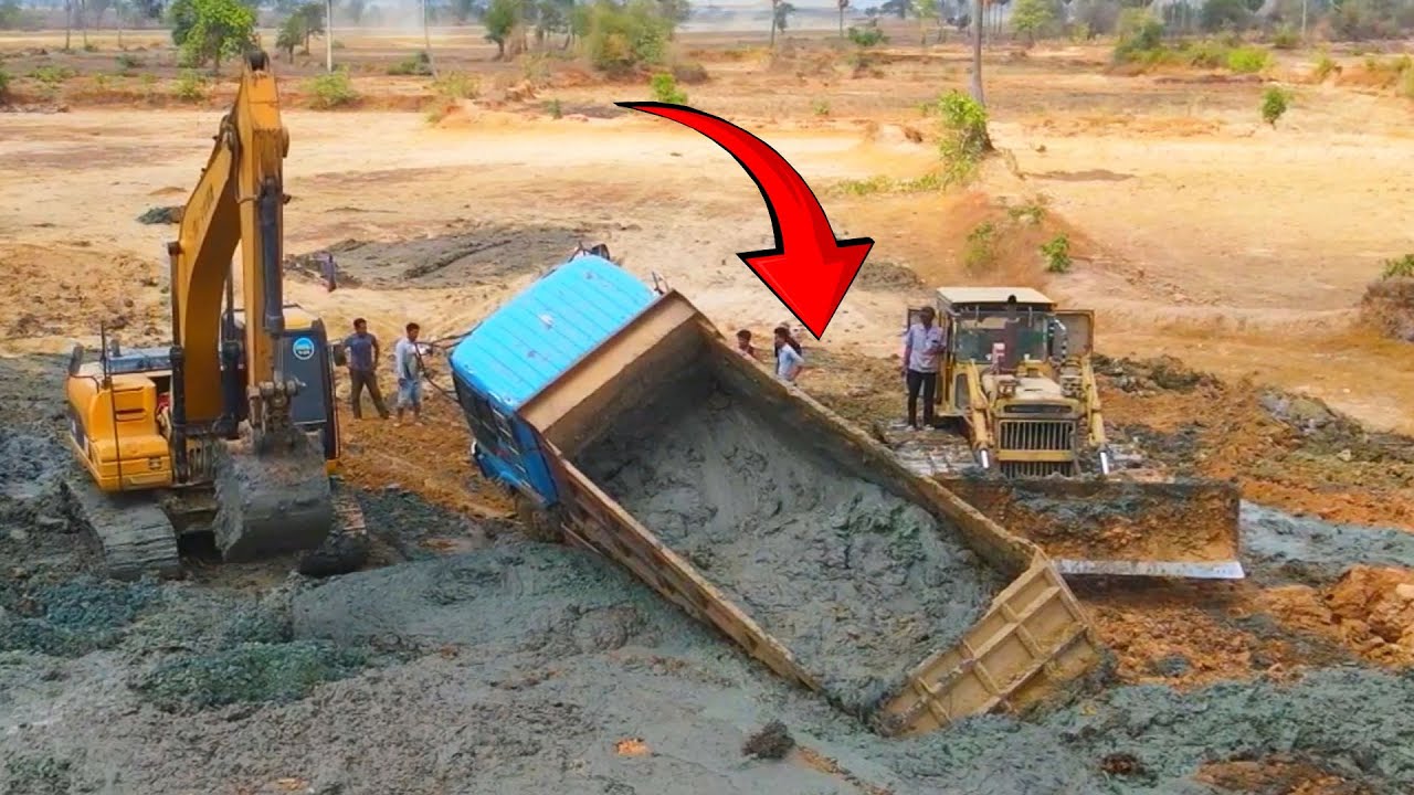 Bulldozers and Excavators Team Up to Rescue a Stuck Dump Truck! - YouTube