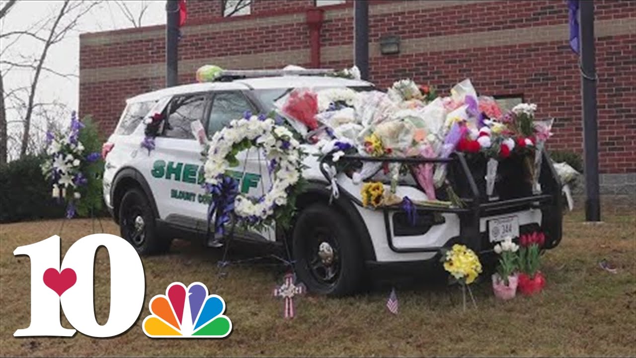 Community members pay their respects to Deputy Greg McCowan at patrol ...