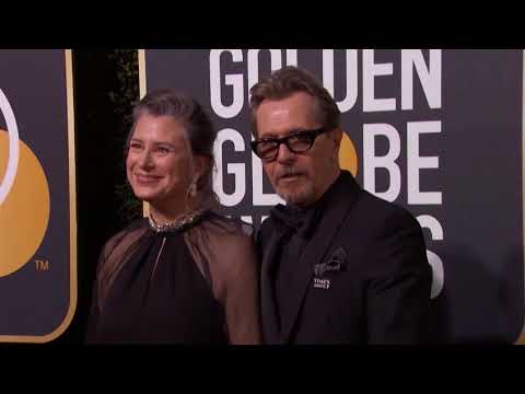 Gary Oldman & Gisele Schmidt Golden Globe Awards Fashion Arrivals (2018) | ScreenSlam