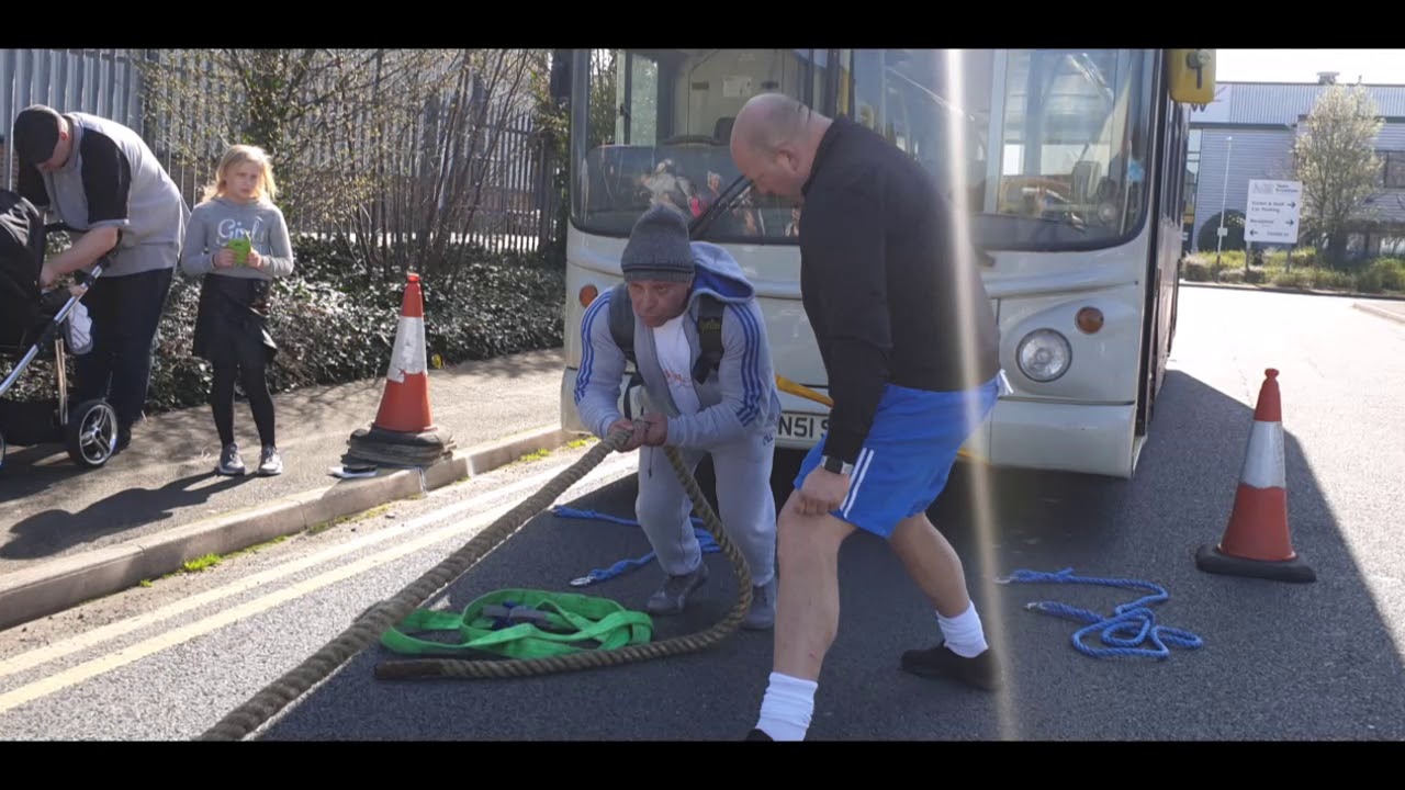 Summa Barker's World Record Bus Pull 12.5T Over 30 metres - Rocky ...