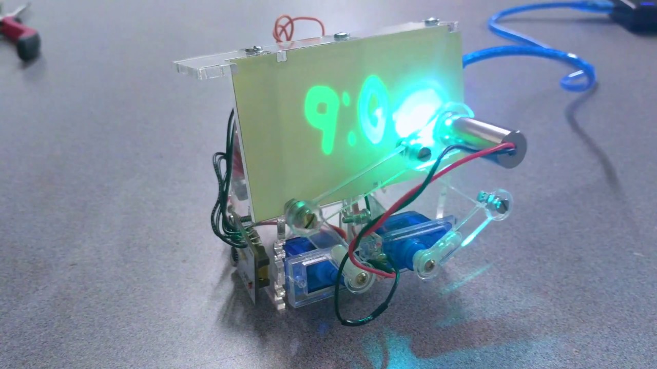 Glow in the Dark Laser Robot Clock - YouTube