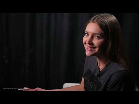 Pretty russian girl Kate is giving an interview and smoking 100mm cigarettes
