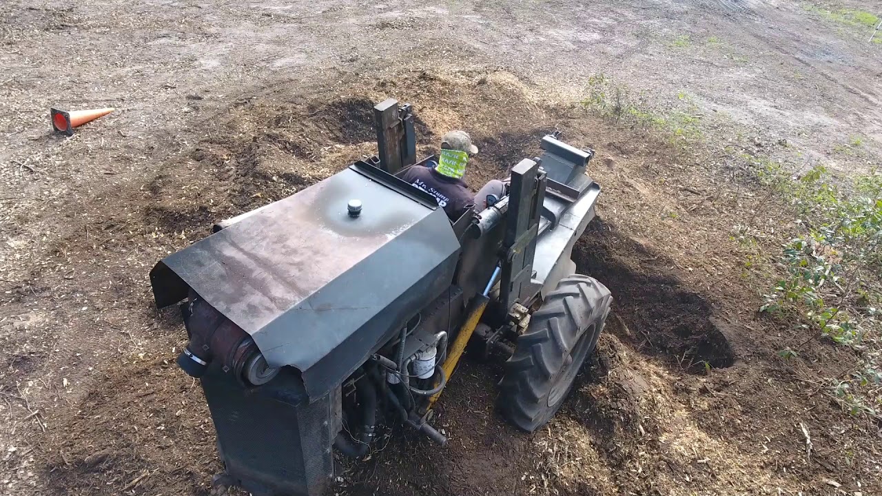 Custom built stump grinder removing a huge stump - YouTube