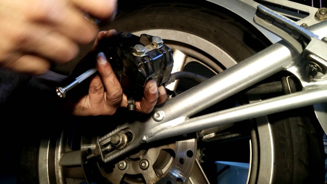 How to replace Sachs MadAss rear brake pads CDF-009 using improvised ...