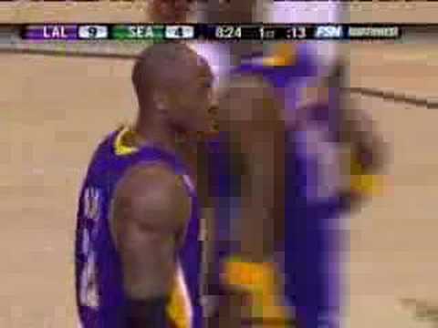 Kobe Bryant punches the ball down and it whacks him in the face ...