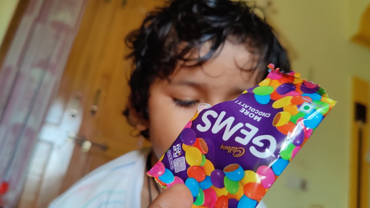 life me first time eating gems #gems #chocolate #experience 😁 - YouTube