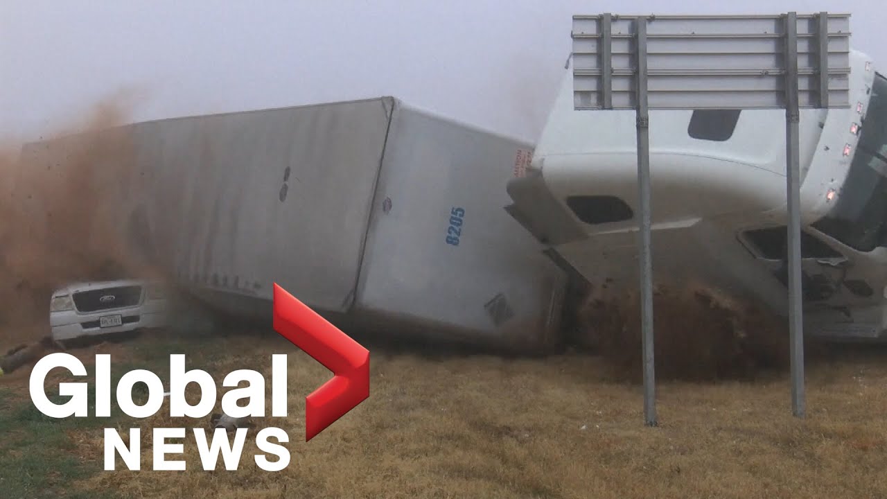 News crew captures terrifying tractor-trailer rollover while covering ...