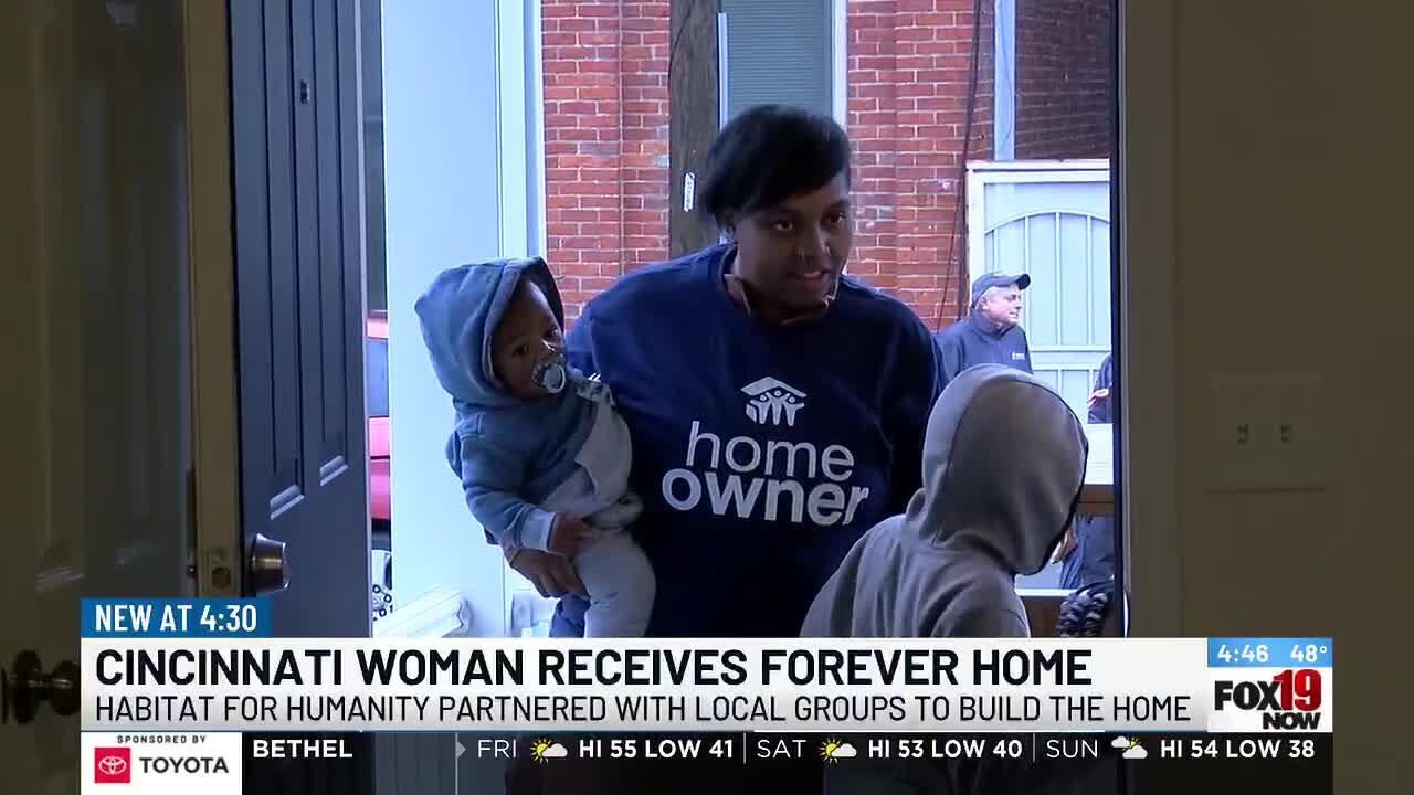Single mother of 4 gets keys to new home - YouTube