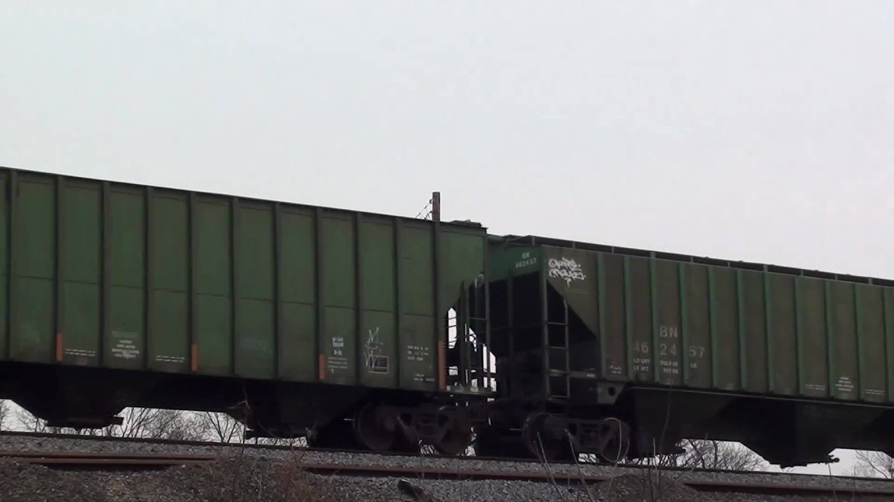 BNSF 8293 leads a grain train - YouTube