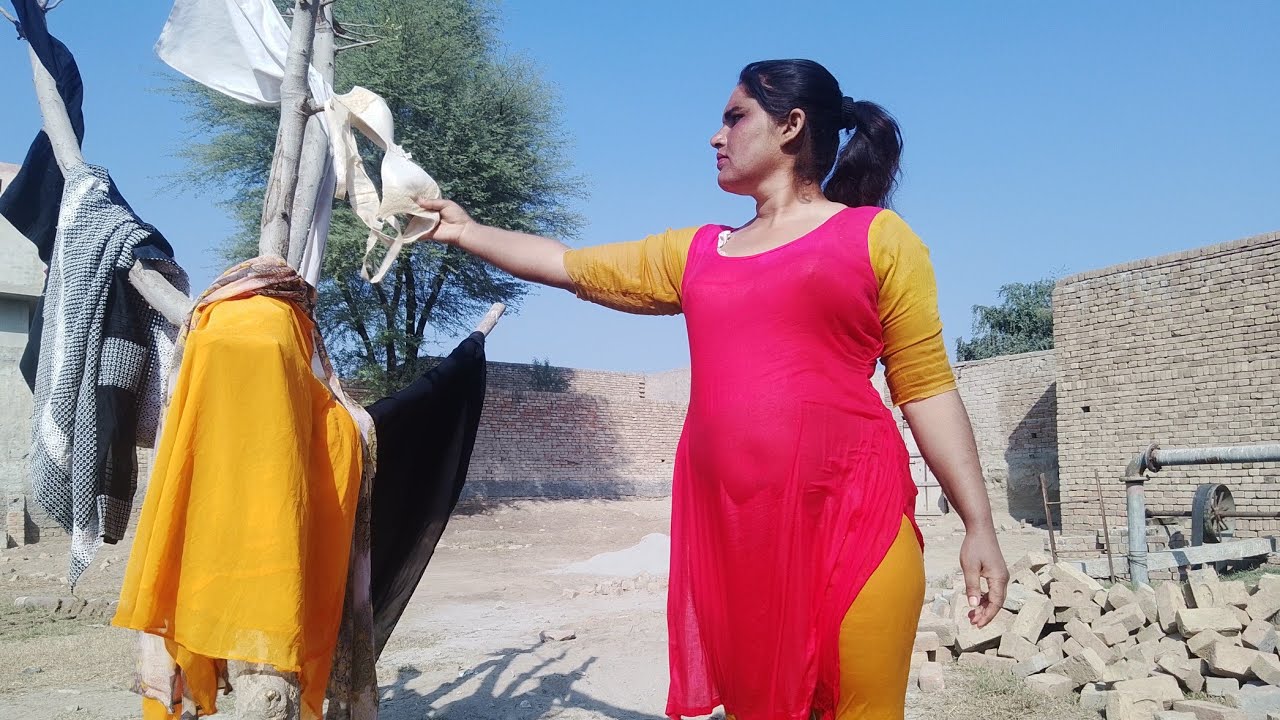 Pakistani village aunty washing clothes _ tube well vlog routine _ Desi ...