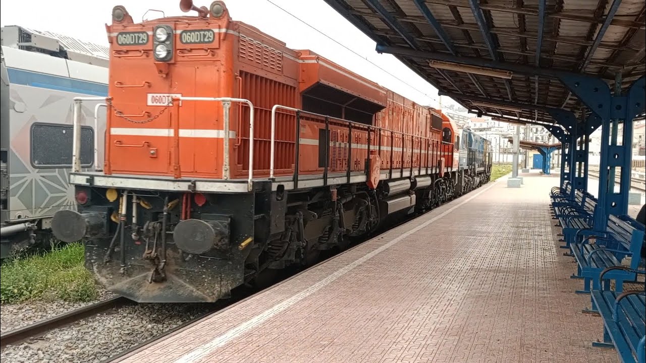 Two locomotives shunting at Agha station (EMD GT46AC + EMD GT36HCW ...