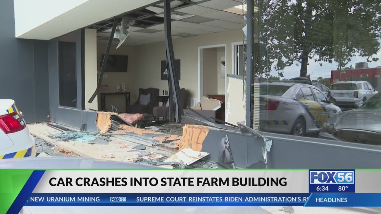 Driver crashes vehicle into Lexington State Farm building - YouTube