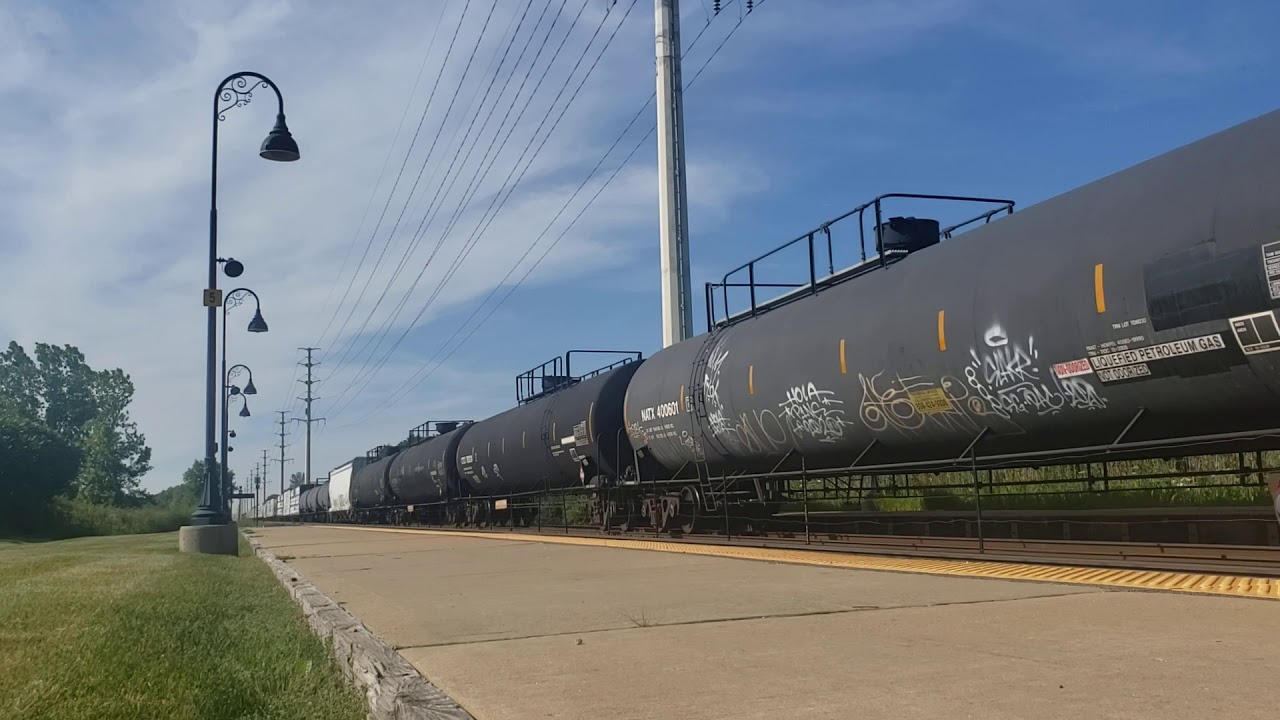 CN mixed Freight with Loads of lumber - YouTube