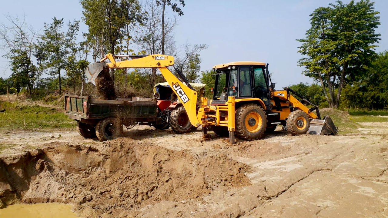 skillful JCB operator-JCB 3dx Xpert Loading Mud in Trolley SAME Tractor ...