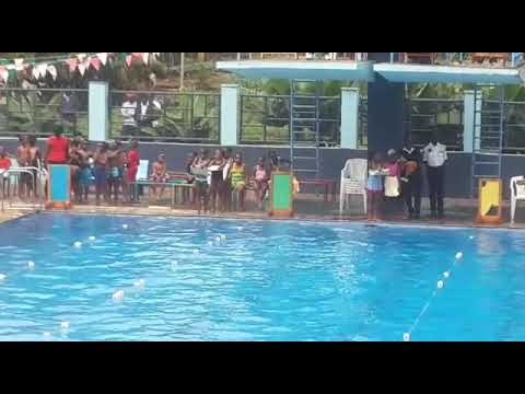 T girl swimming in a very deep pool