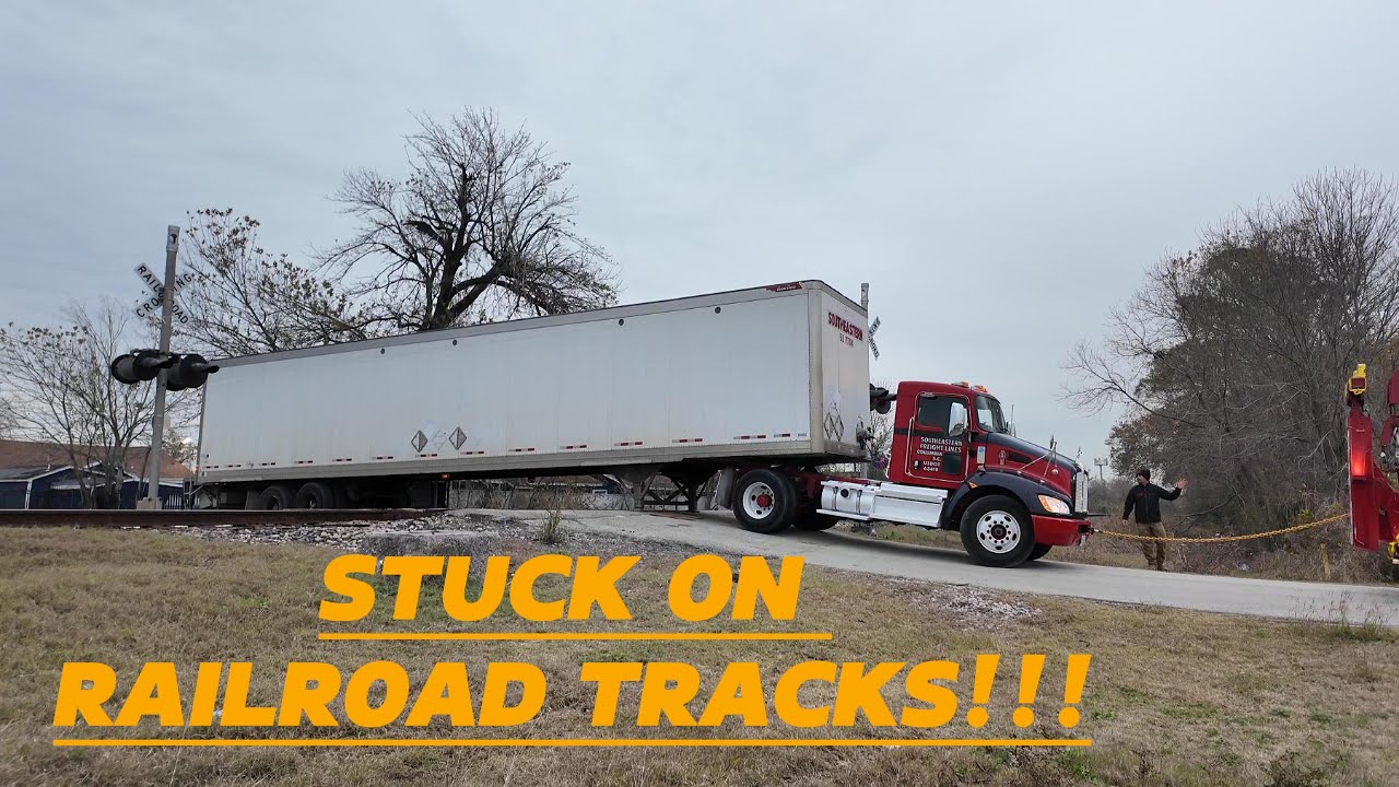 STUCK ON RAILROAD TRACKS!!! - YouTube