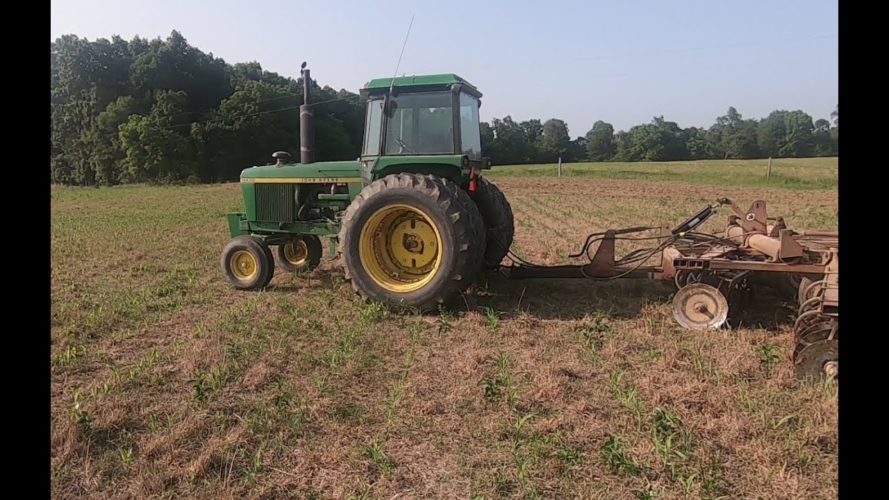 Working ground dry and disking up corn - YouTube