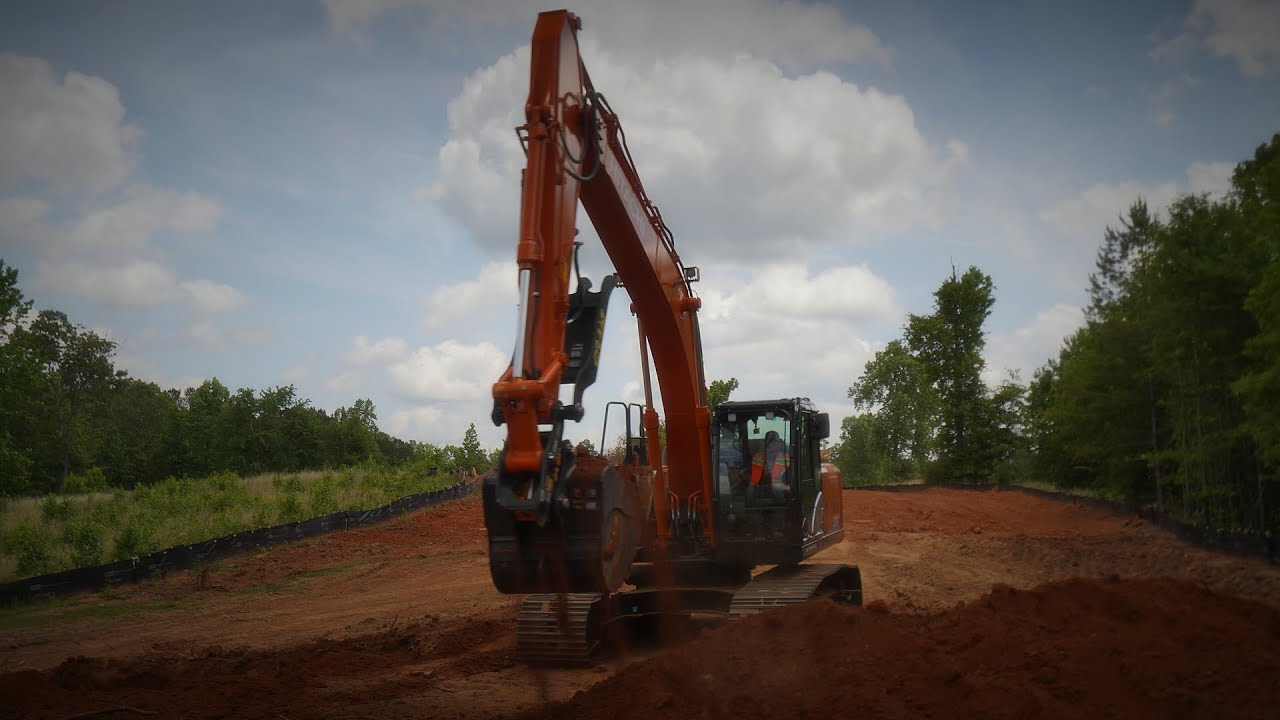 How To Pull Concrete Without a Thumb in an Excavator - YouTube
