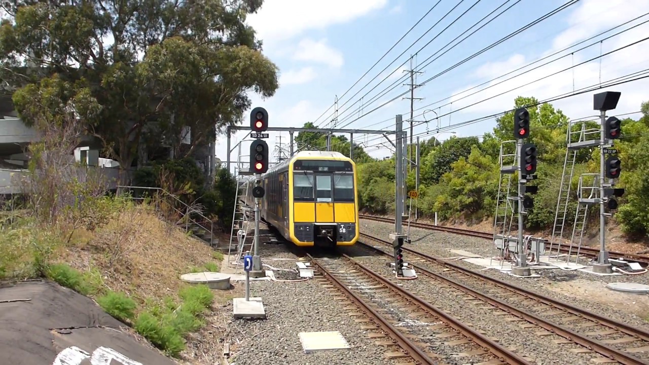 A Sydney trains T set departing from Sutherland Station bound for Bondi ...