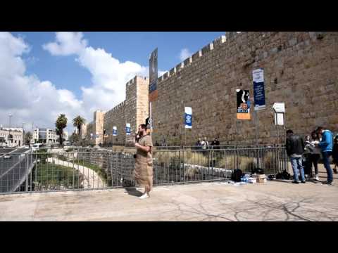 Street preaching in Jerusalem, Israel at Jaffa Gate when mob begins to form