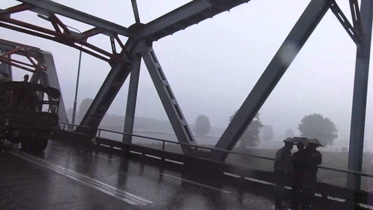 Train over Thompson bridge at Grave. The Netherlands - YouTube