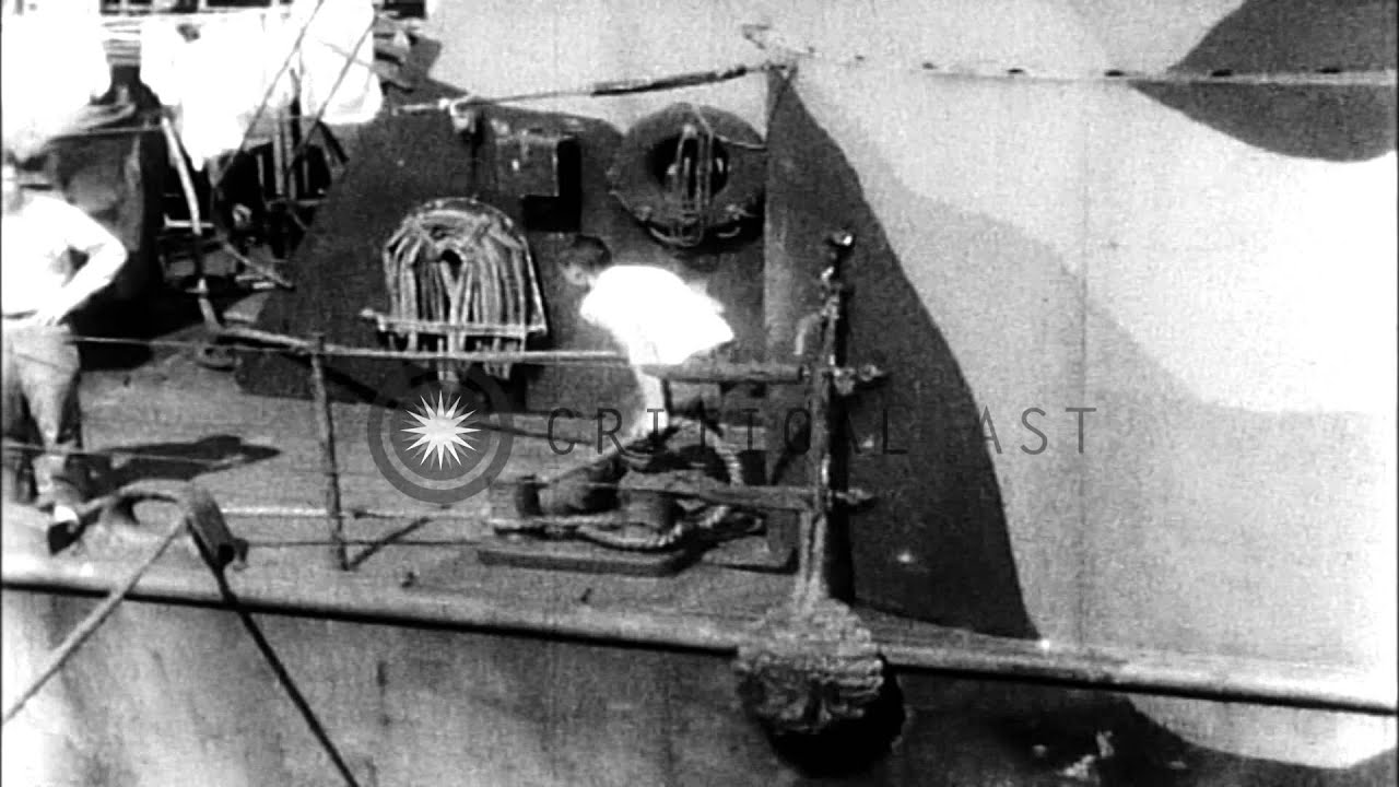 A 20mm gun crew on forecastle of LCI underway in the Pacific Ocean ...