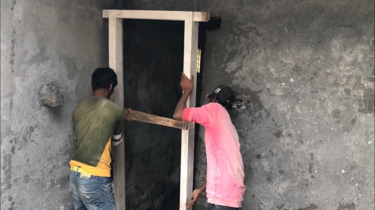 Wood Door Frame installation and tube level checking, brick ...