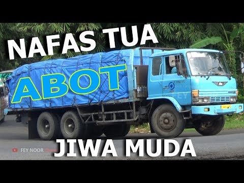 TRUK TUA MUATAN BERAT NANJAK DI TANJAKAN TIKUNGAN TIMEZ