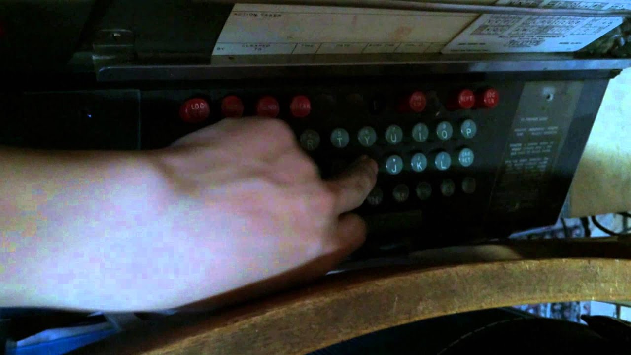 Teletype 15 KSR and 28 ASR talking via modem - YouTube