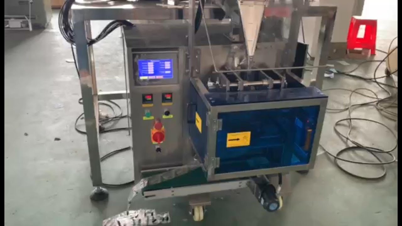 Vibrating tray packaging machine-packaging vitamin pills demonstration ...