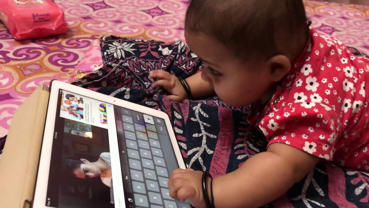 Baby playing on iPad - YouTube