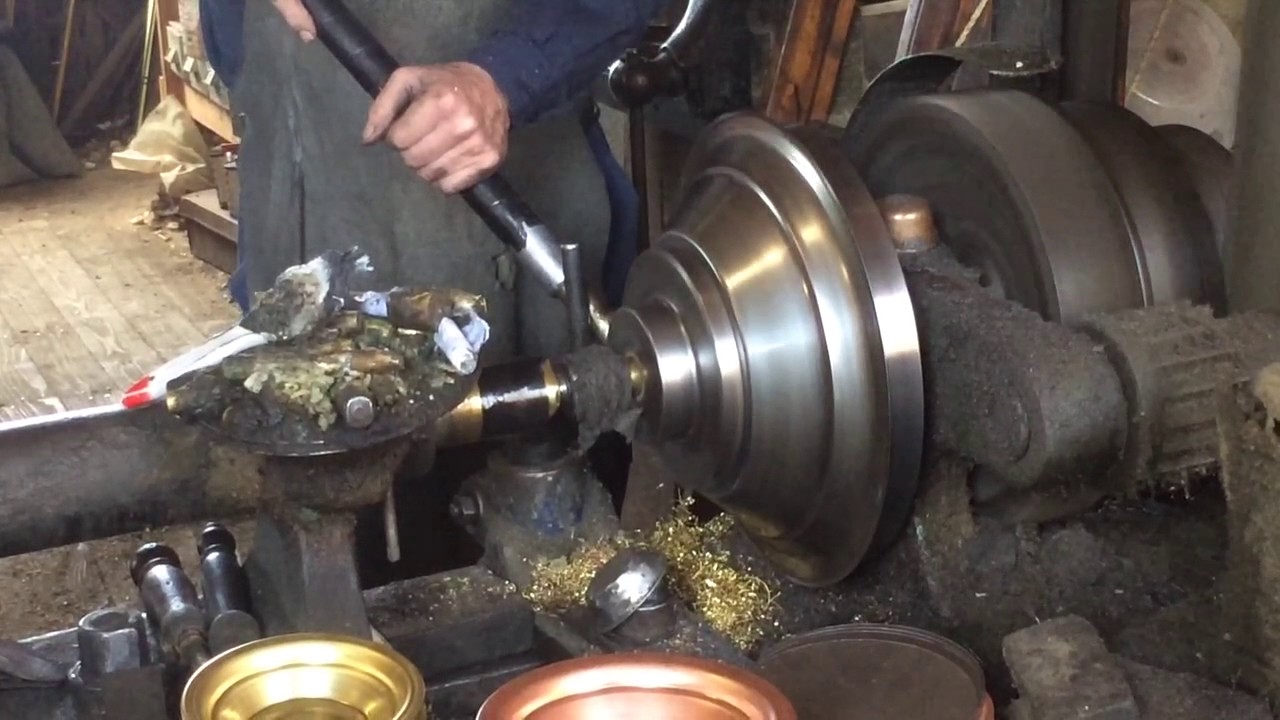 Metal spinning a pan used for panning gold - YouTube