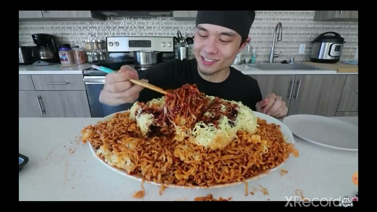 Watching Matt Stonie eat 15 pack of spicy noodles - YouTube