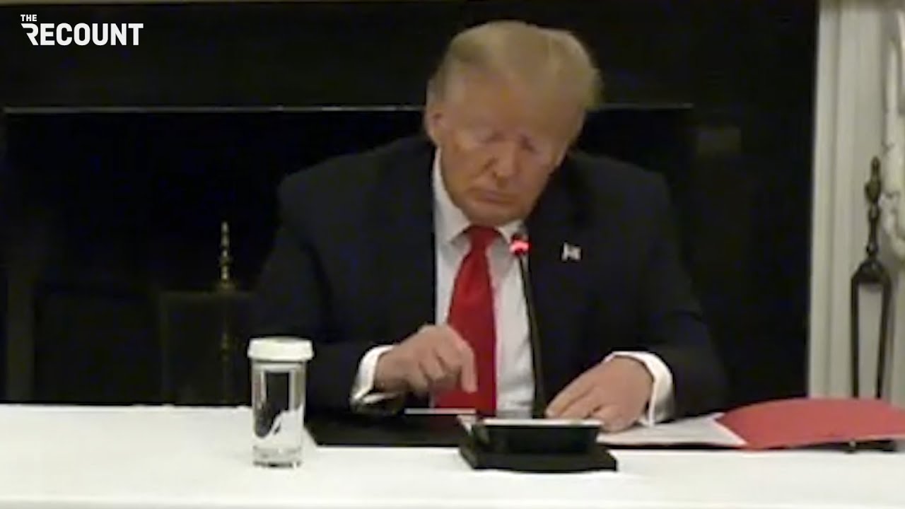 Trump Looks At His Phone During Meeting - YouTube