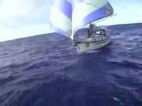 Singlehanded sailing with twin headsails view from a kitecam - YouTube