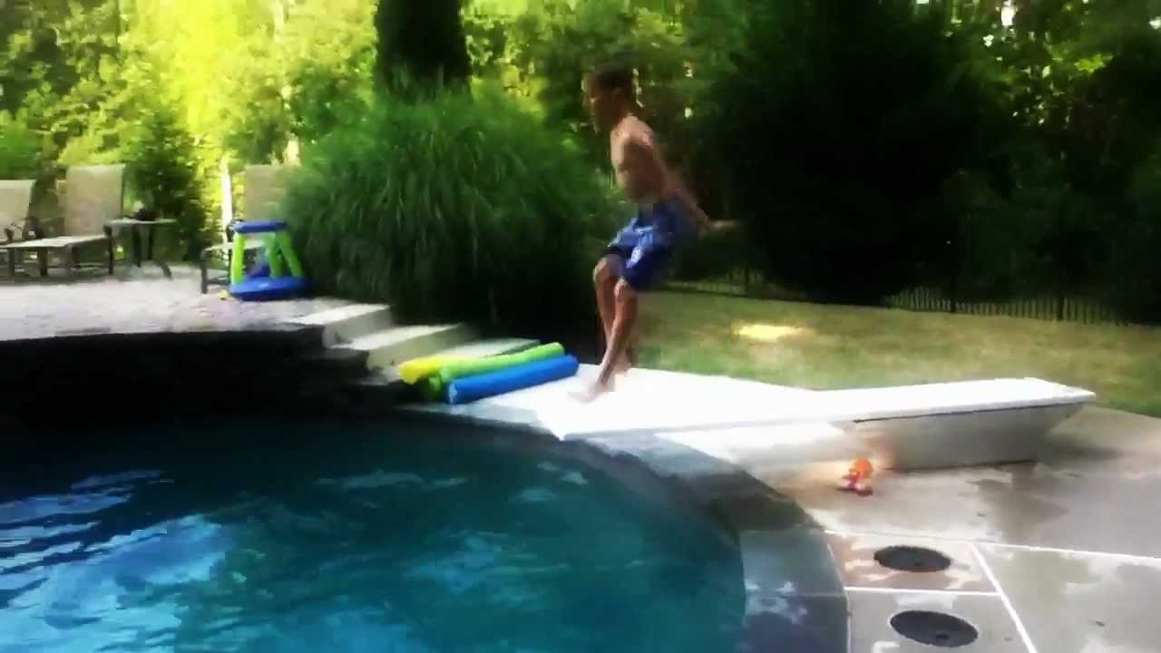 Full gainer off diving board by 11 year old - YouTube