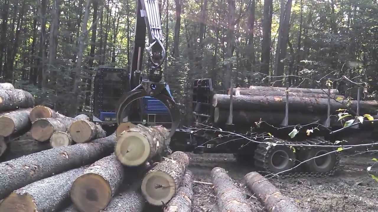 TimberPro TF830B unloading logs - YouTube
