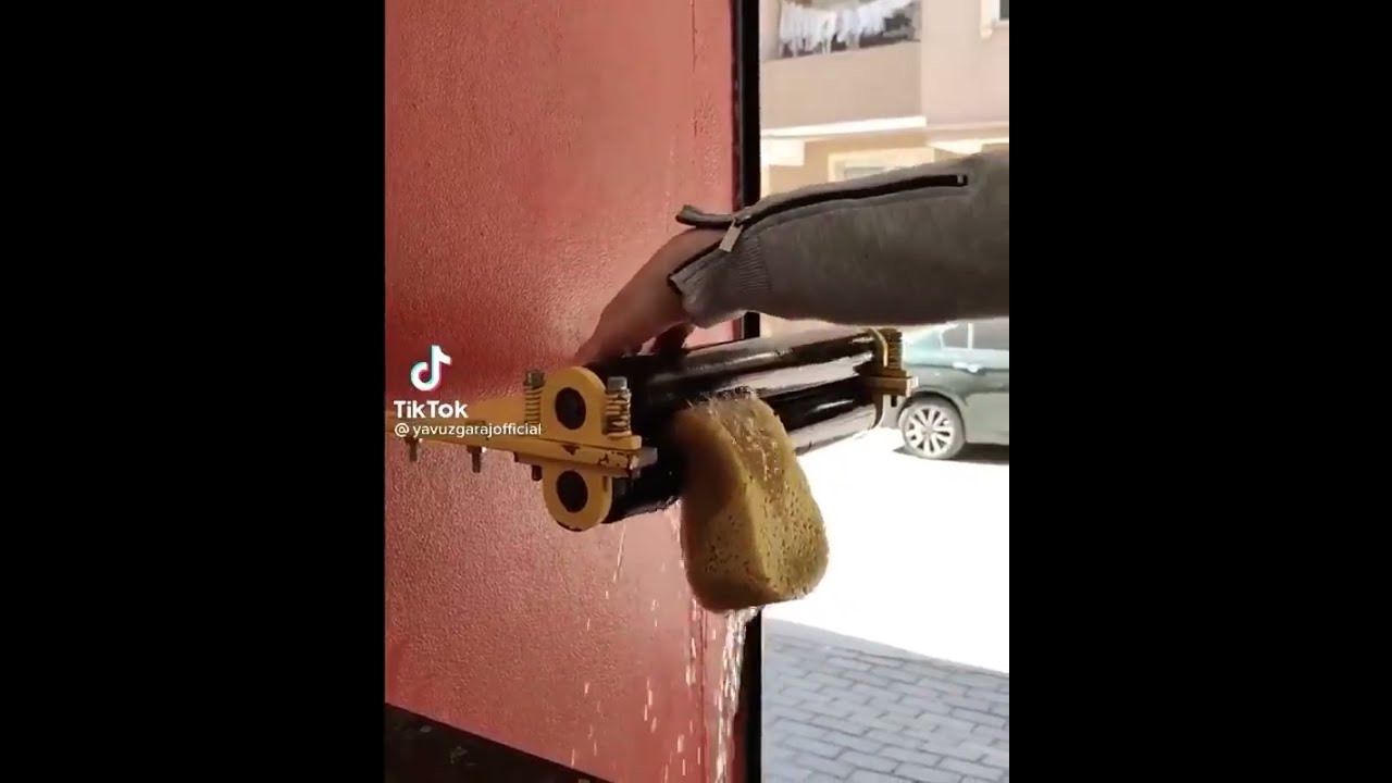 Ringing out a sponge - YouTube