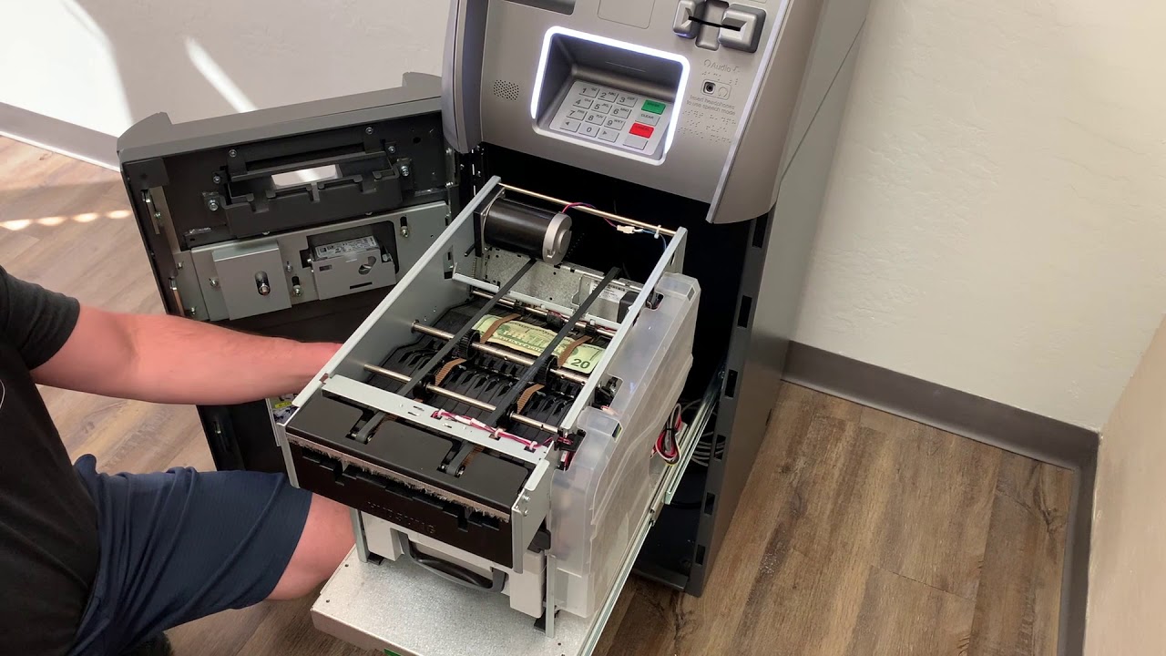 Clearing a bill jam on a Hyosung ATM - YouTube
