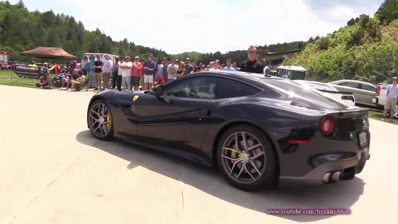 Ferrari F12 Vs Cadillac CTS-V 1/2 mile drag race - YouTube