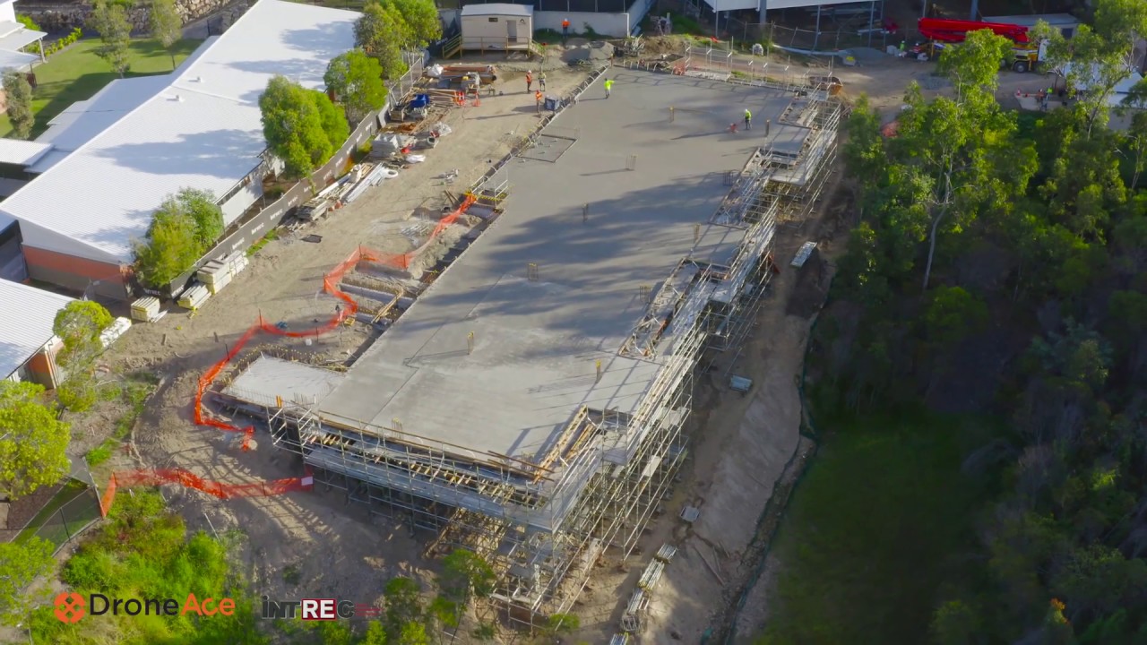 INTREC drone video of Augusta State School concrete slab pour - YouTube