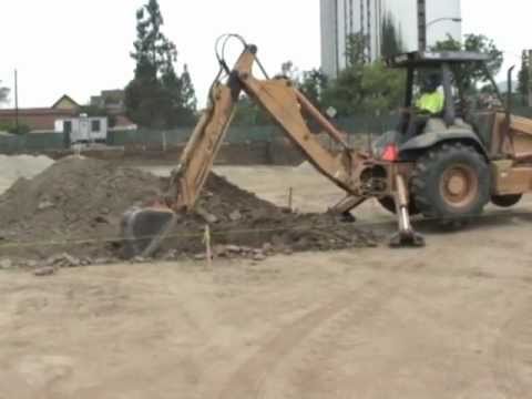 Totally Trucks- Excavator Digging a Ditch - YouTube