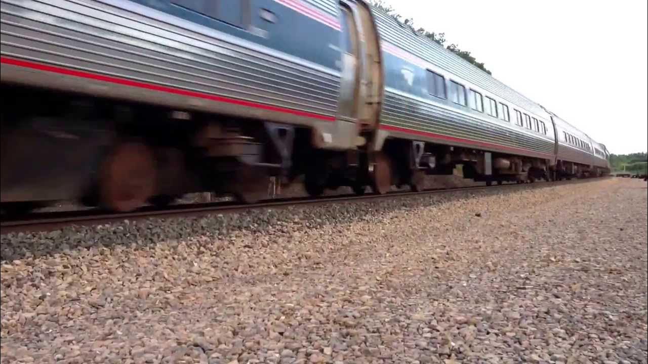 Amtrak Phase 2 heritage unit 66 leading 49 at Rectors NY with exhibit train on rear. - YouTube