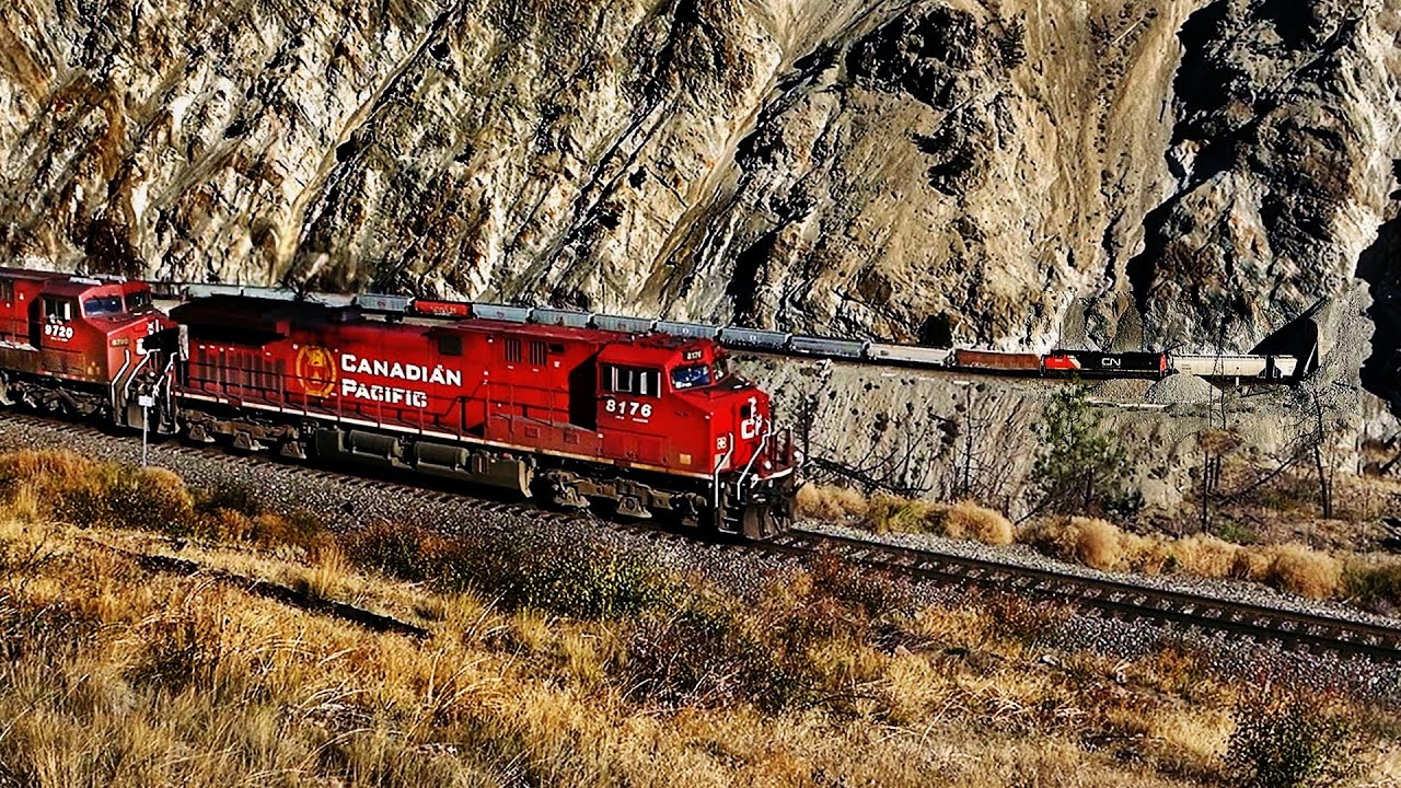 CHASING TRAINS INTO THE CANYON, TRAINS ON BOTH SIDES! THRU TUNNELS & SLIDE SHEDS! - YouTube