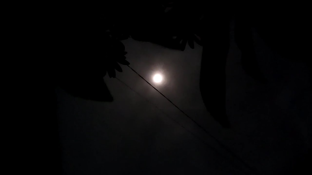 the moon is shrouded in black mist at night - YouTube