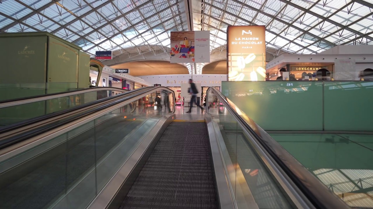 France, Paris, Charles de Gaulle airport, walking around, 7X escalator ...